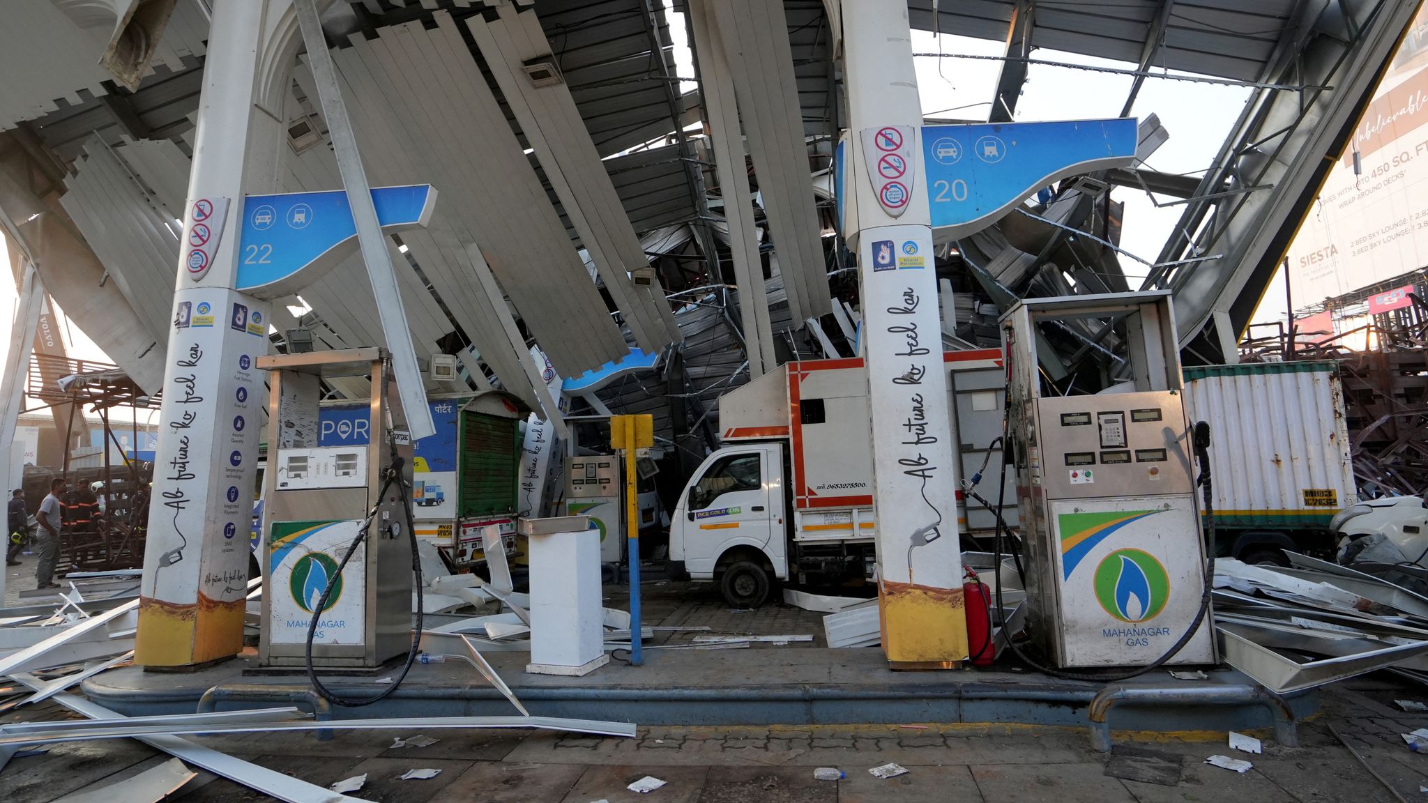 Mumbai billboard collapse: At least 14 killed and dozens feared trapped ...