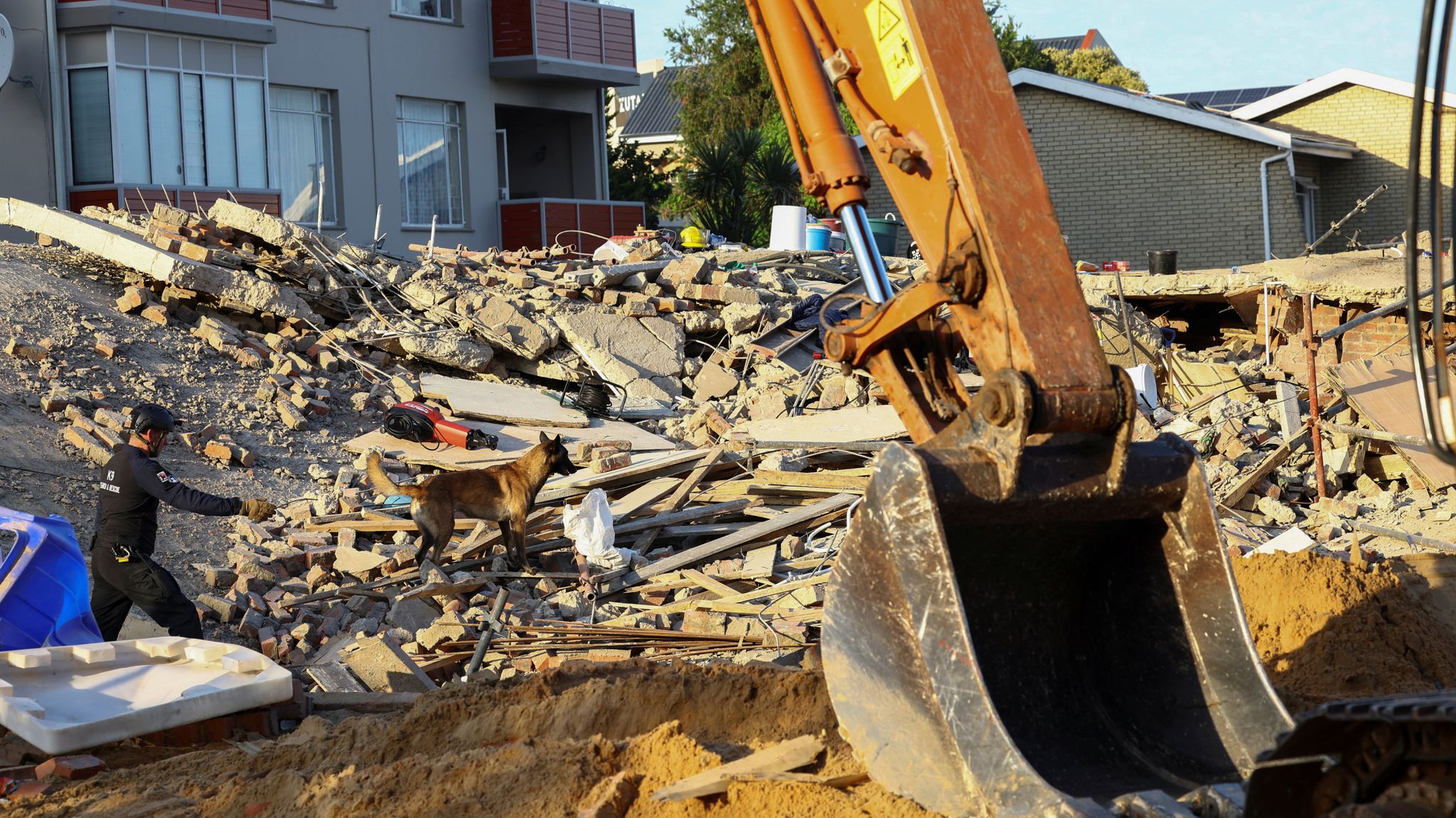 South Africa: At least five dead and dozens more trapped after multi-storey apartment building ...