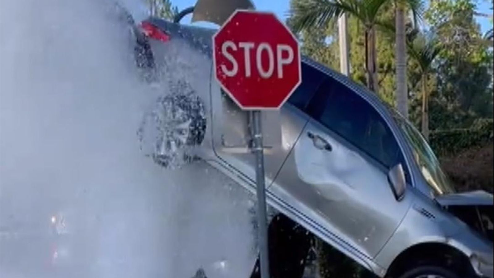 California: Car stuck on fire hydrant after collision | World News ...