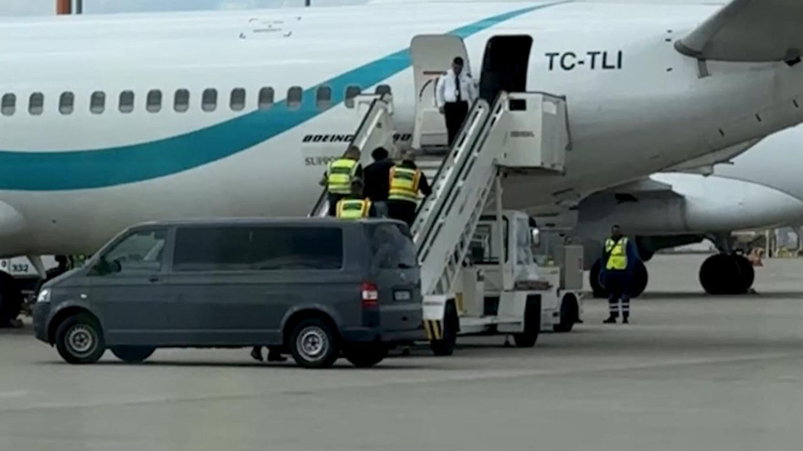 Migrants look to UK as Germany toughens laws - and warn that people ...
