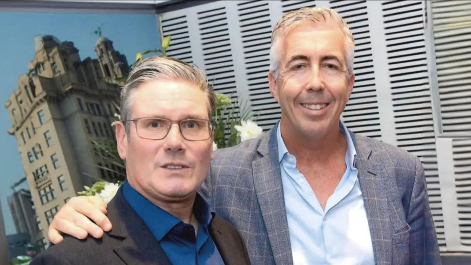 Greenpeace protester climbs on top of Conservative election campaign ...