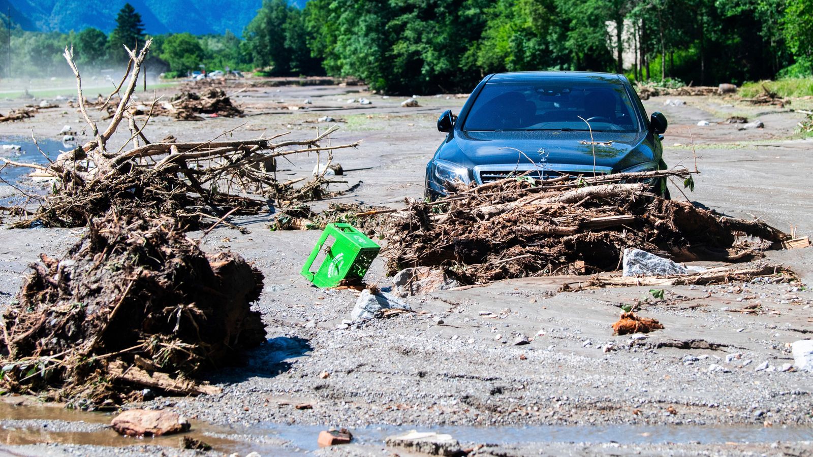 Switzerland: Three people missing after once-in-30-year rains cause ...