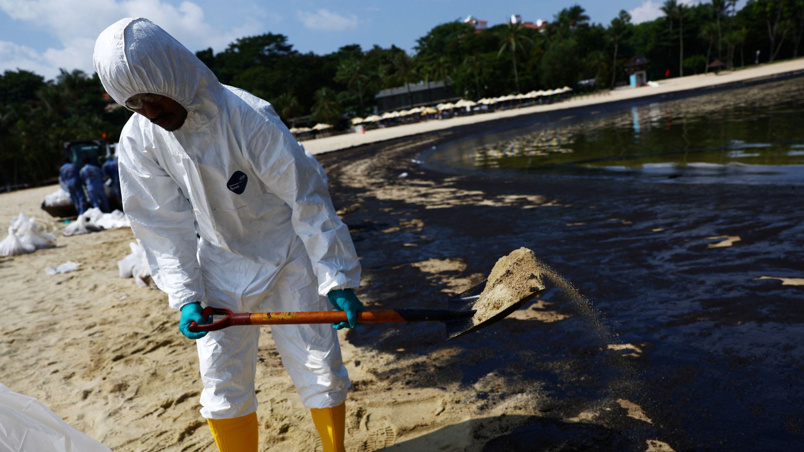 Singapore says boat 'lost control' and hit tanker causing oil spill ...