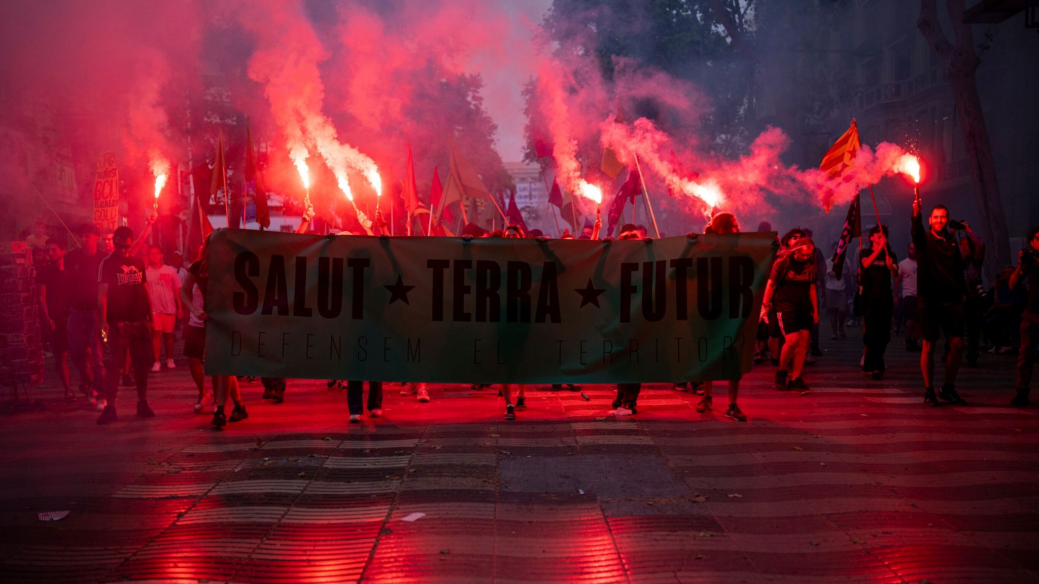 Thousands march against mass tourism in Spain's Balearic Islands as ...