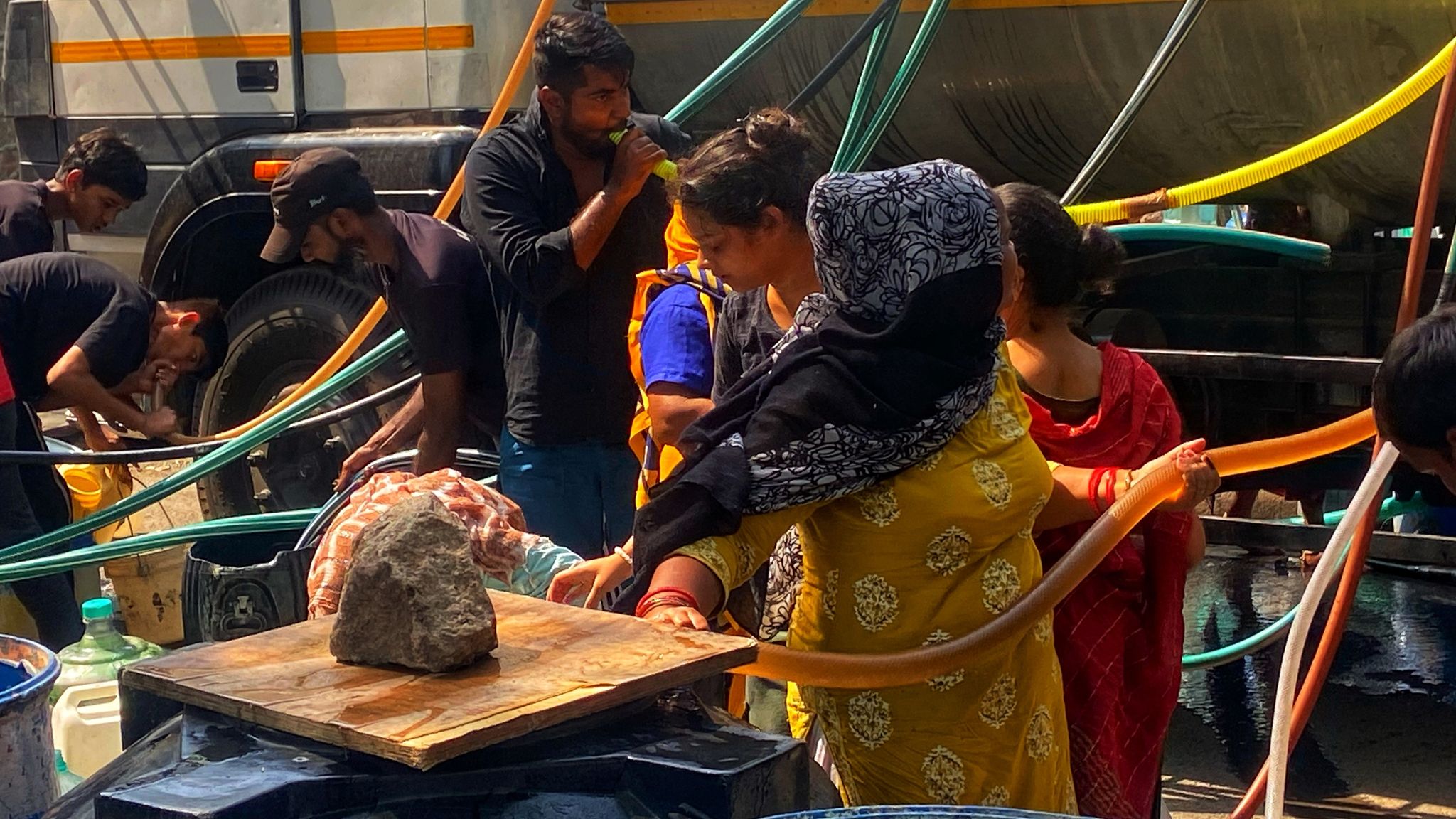 India's 'glaring inequalities' laid bare as hundreds wait for water ...