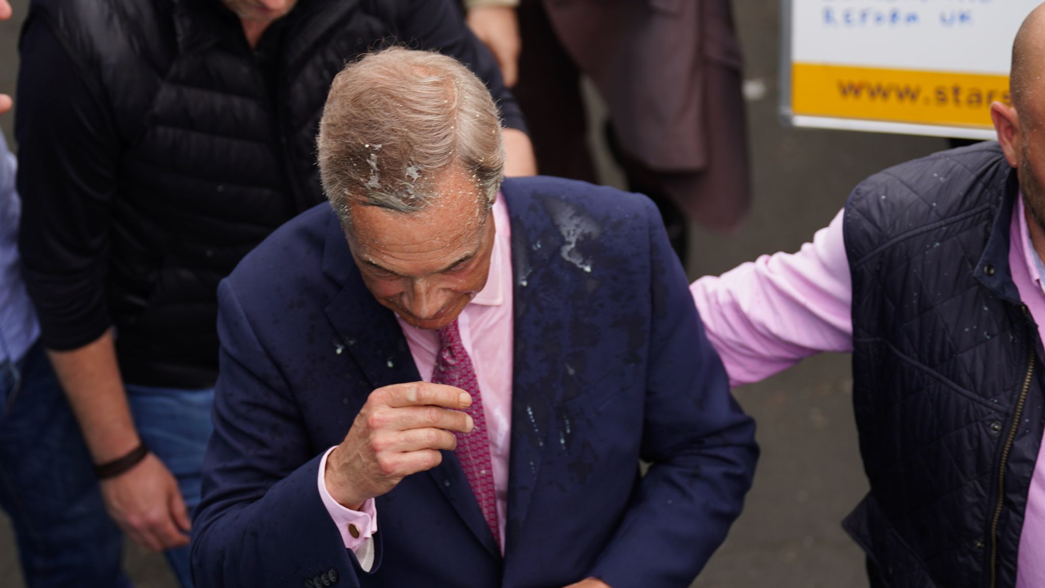 Woman, 25, charged with assault after milkshake thrown at Nigel Farage ...