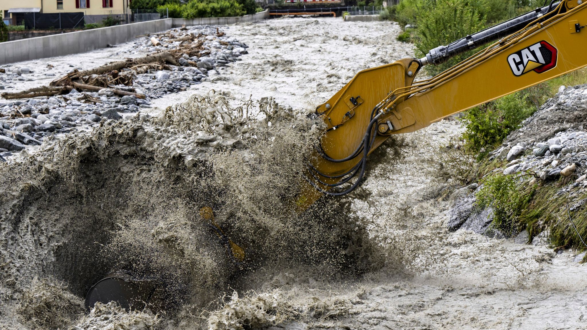 Switzerland: Three people missing after once-in-30-year rains cause ...
