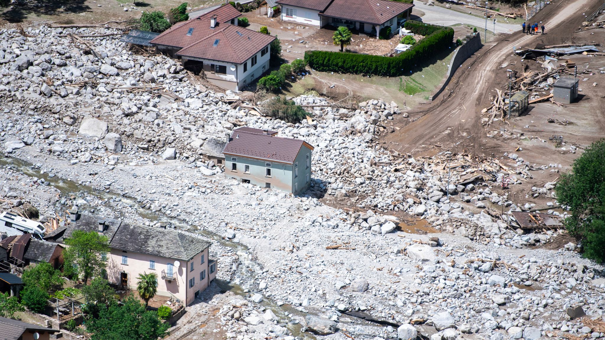 Switzerland: Three people missing after once-in-30-year rains cause ...