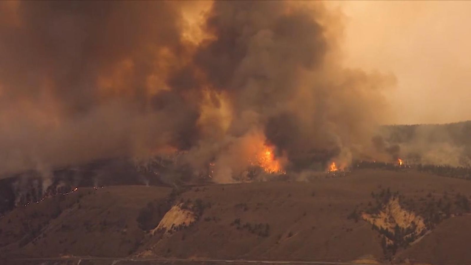 Hundreds of out-of-control wildfires burn across western Canada | World News | Sky News