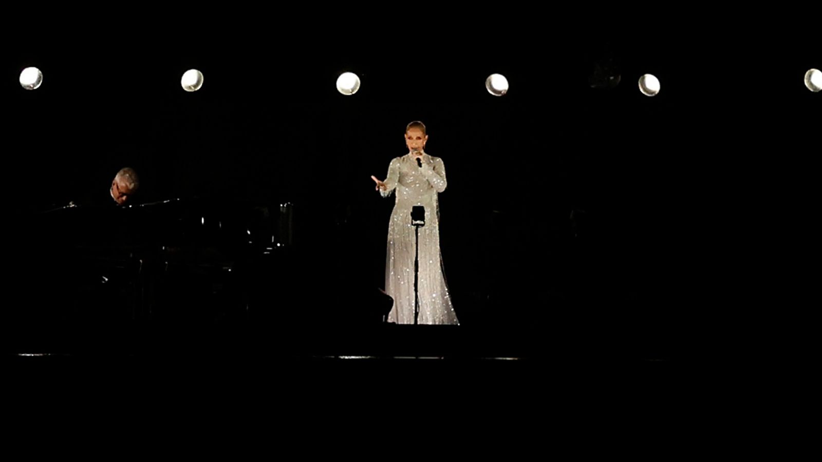 Celine Dion makes spectacular comeback with Eiffel Tower performance at ...