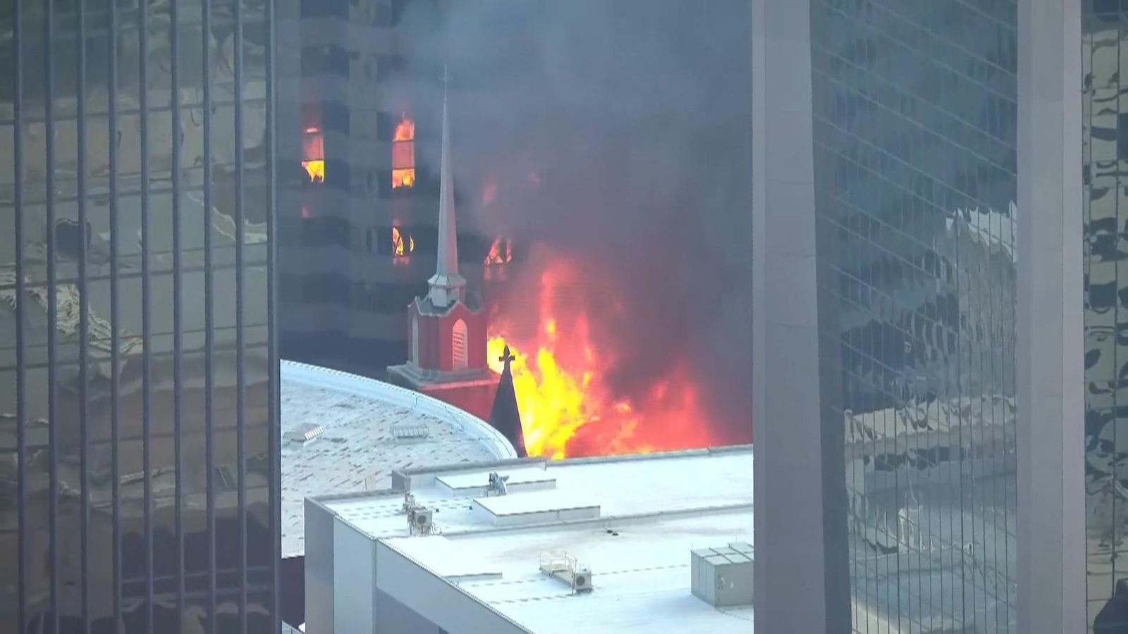 Fire damages historic church in Dallas as column of smoke towers over ...