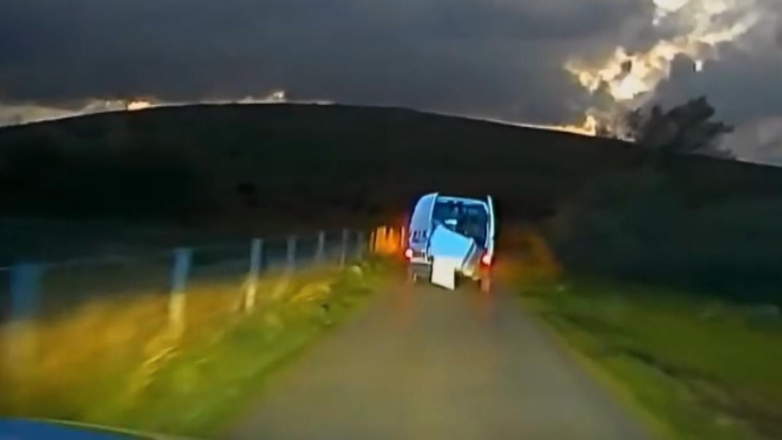 Driver of van running away from the police throws freezer at car in ...