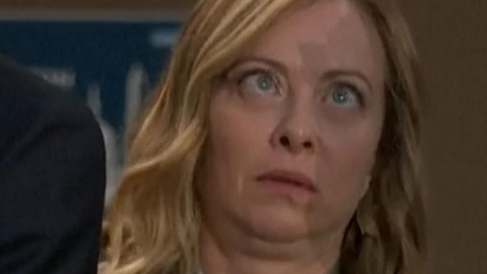 Italian Prime Minister Giorgia Meloni appears to be bored with waiting ...