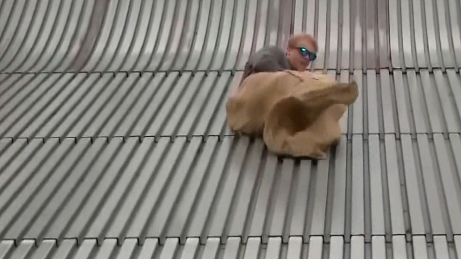 Giant slide reopens in Detroit with softer landing | Offbeat News | Sky ...