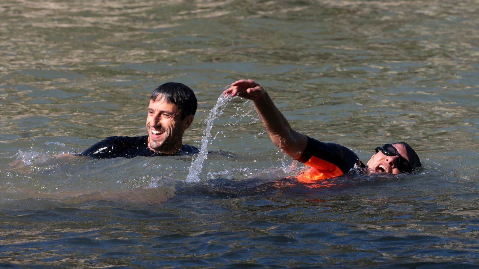 Paris mayor swims in River Seine to prove it's clean before Olympics ...