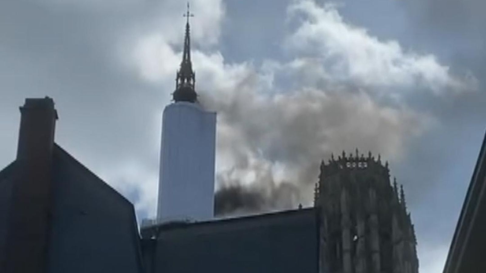 Spire of France's Rouen cathedral goes up in flames | World News | Sky News