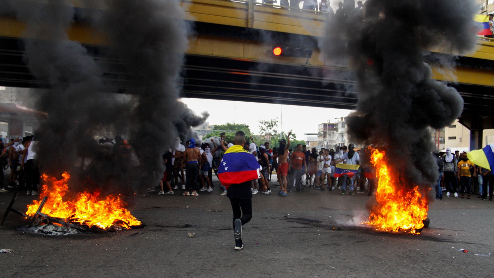 Venezuela: Protesters clash with police over disputed election result ...