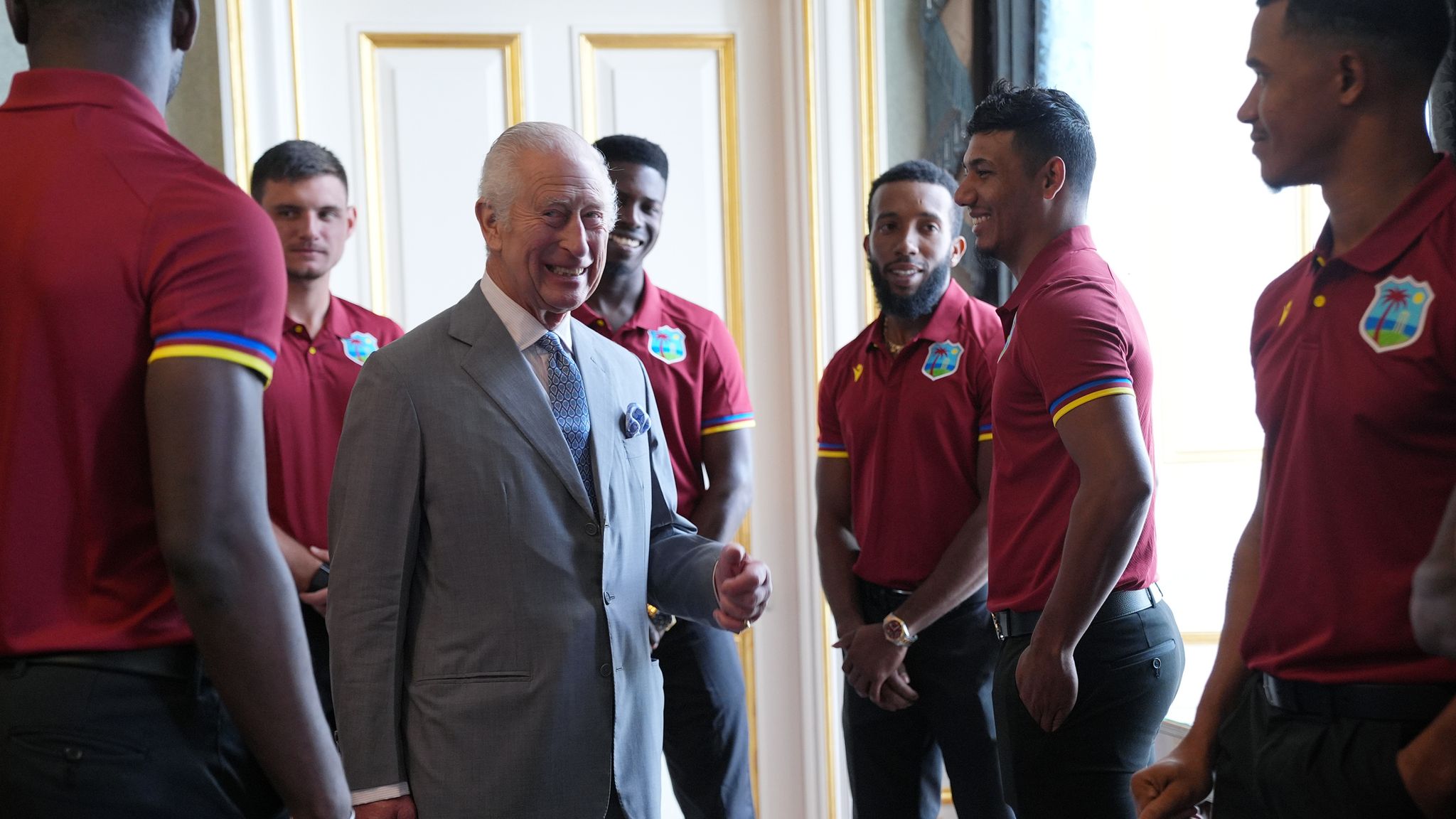 King Charles learns new handshake with West Indies cricket team at ...