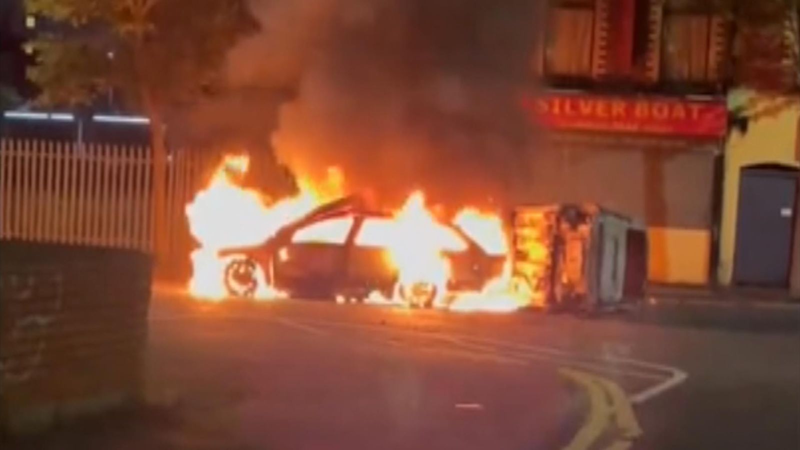 Belfast Riots Protesters Carrying 'Coolock Says No' Sign Join Belfast