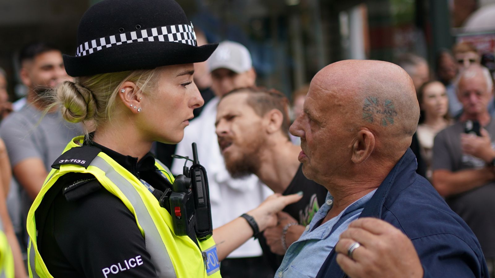 More than 90 arrested after officers injured in violent protests across ...