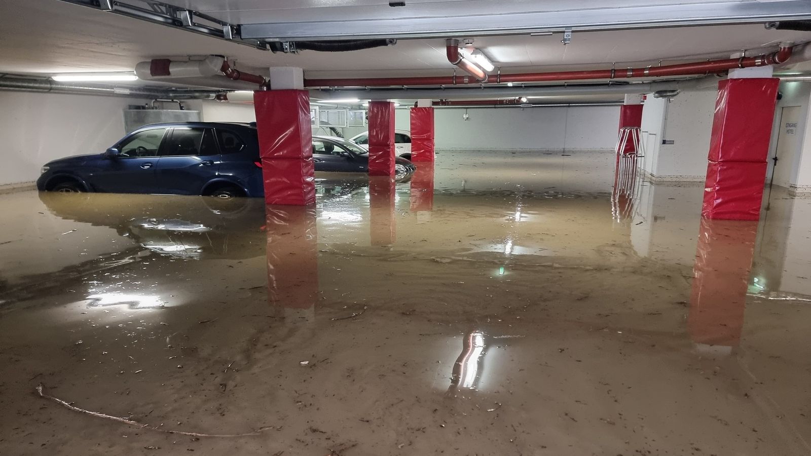 Austria: Parts of Vienna under water after record rainfall - as cars ...