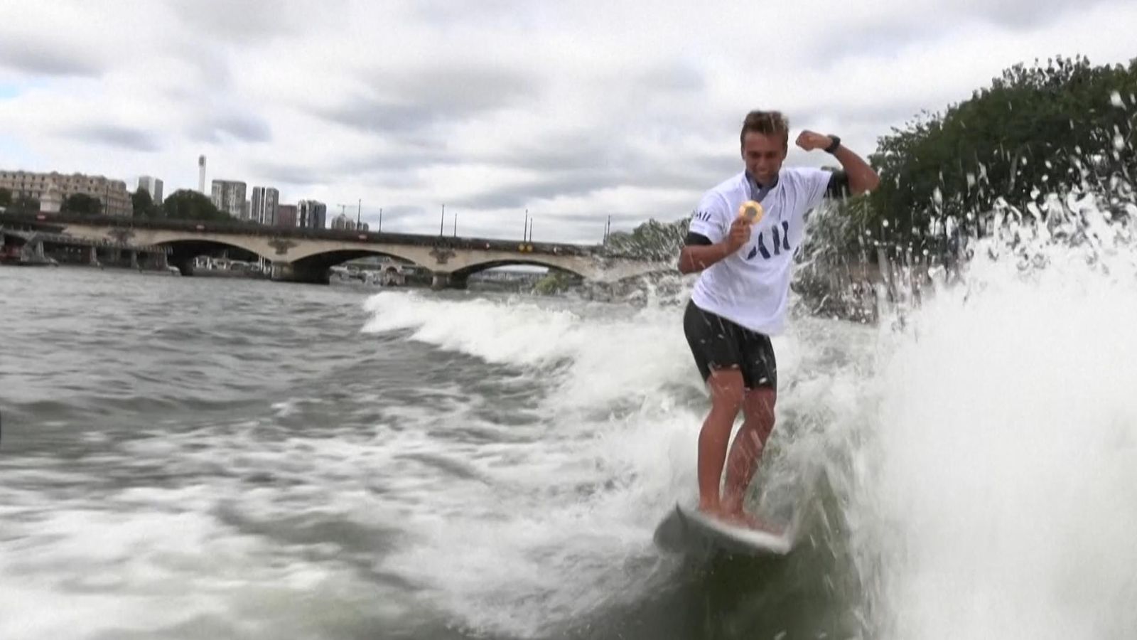 French Olympic gold medallist Kauli Vaast surfs the Seine | News UK ...