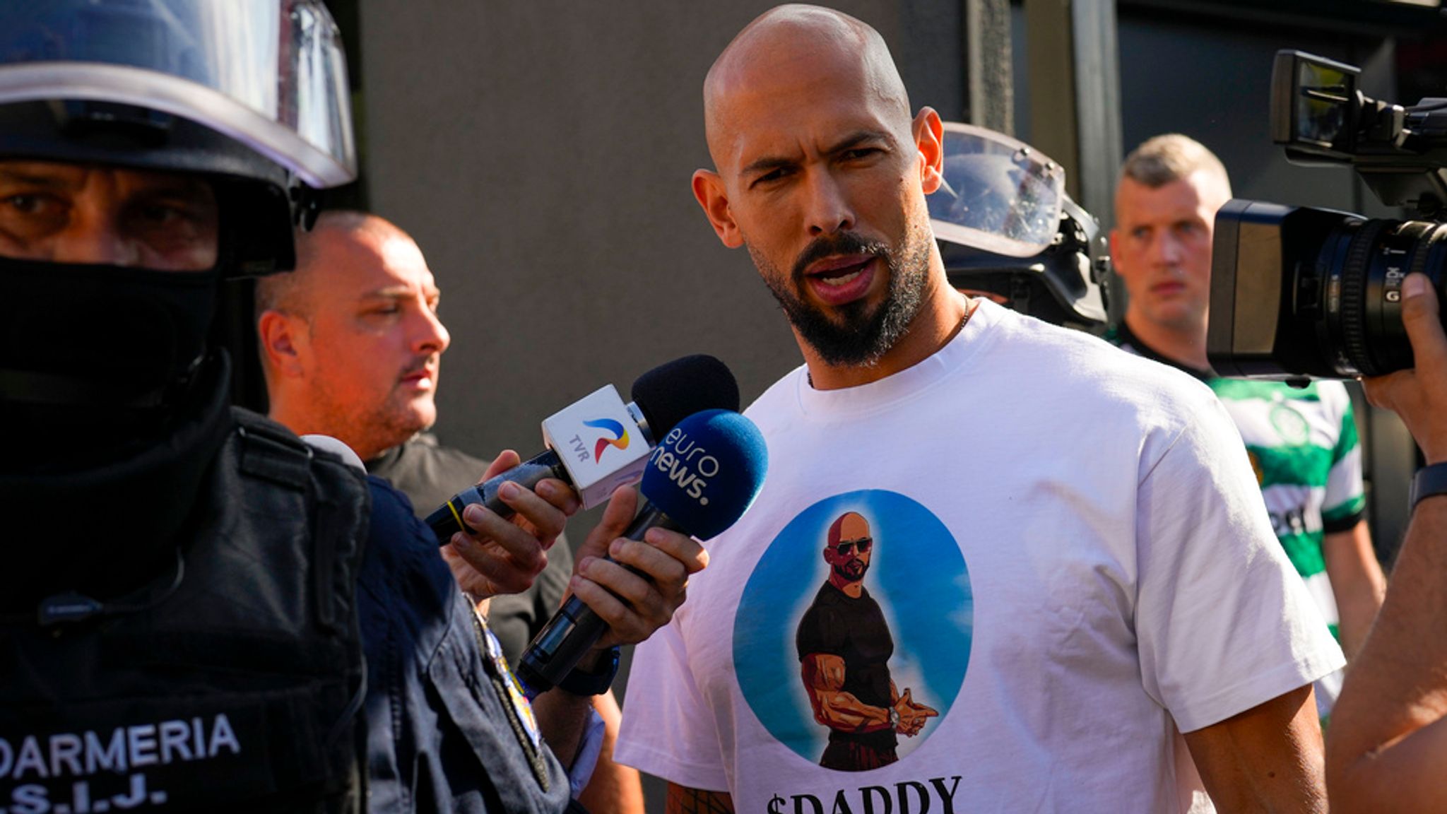 Andrew Tate under house arrest over fresh allegations after home raided ...