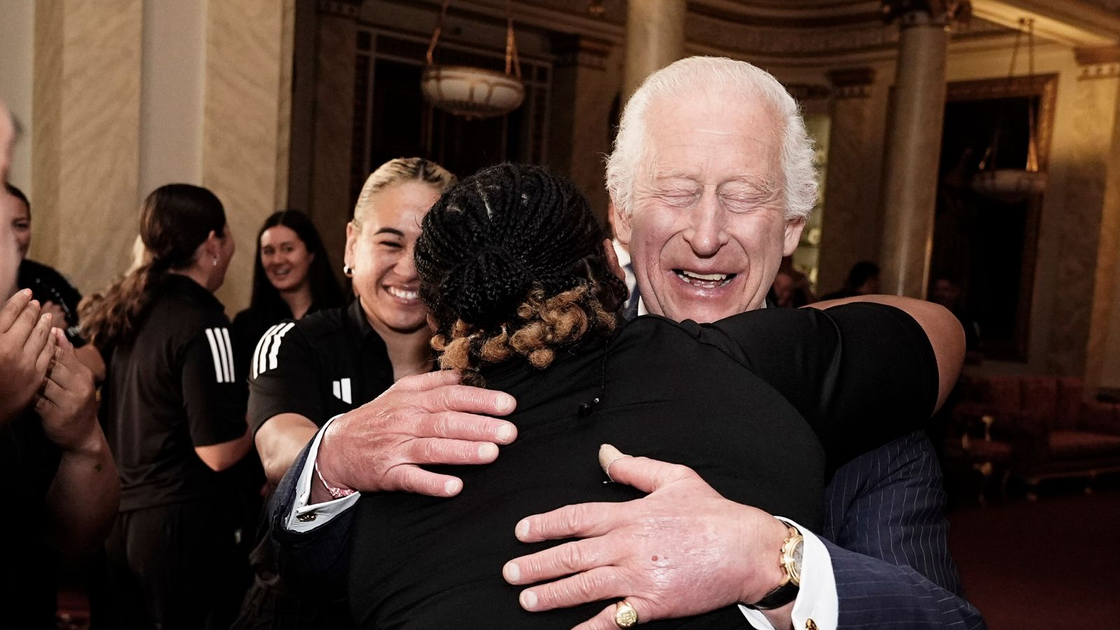 King Charles giggles as he finds himself in middle of New Zealand women ...