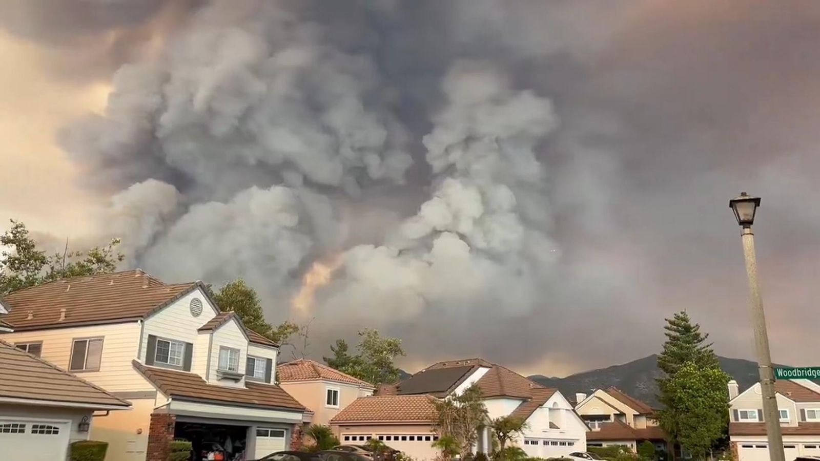Fast-growing Orange County wildfire prompts evacuations | US News | Sky ...