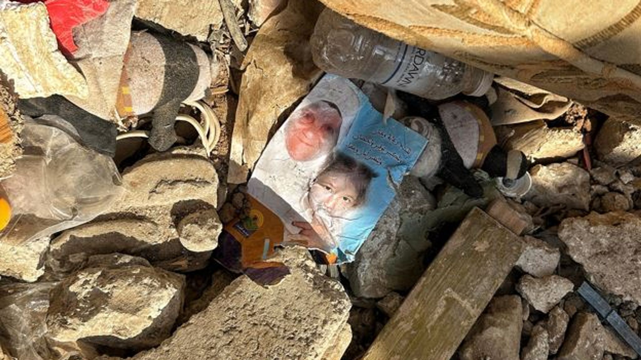 Anxious families line the pavement as dozens remain missing in the ...