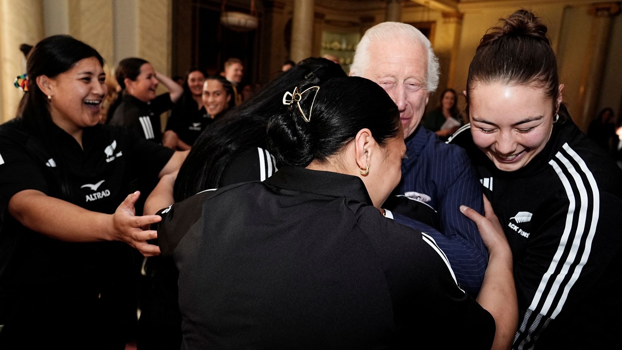 King Charles giggles as he finds himself in middle of New Zealand women ...