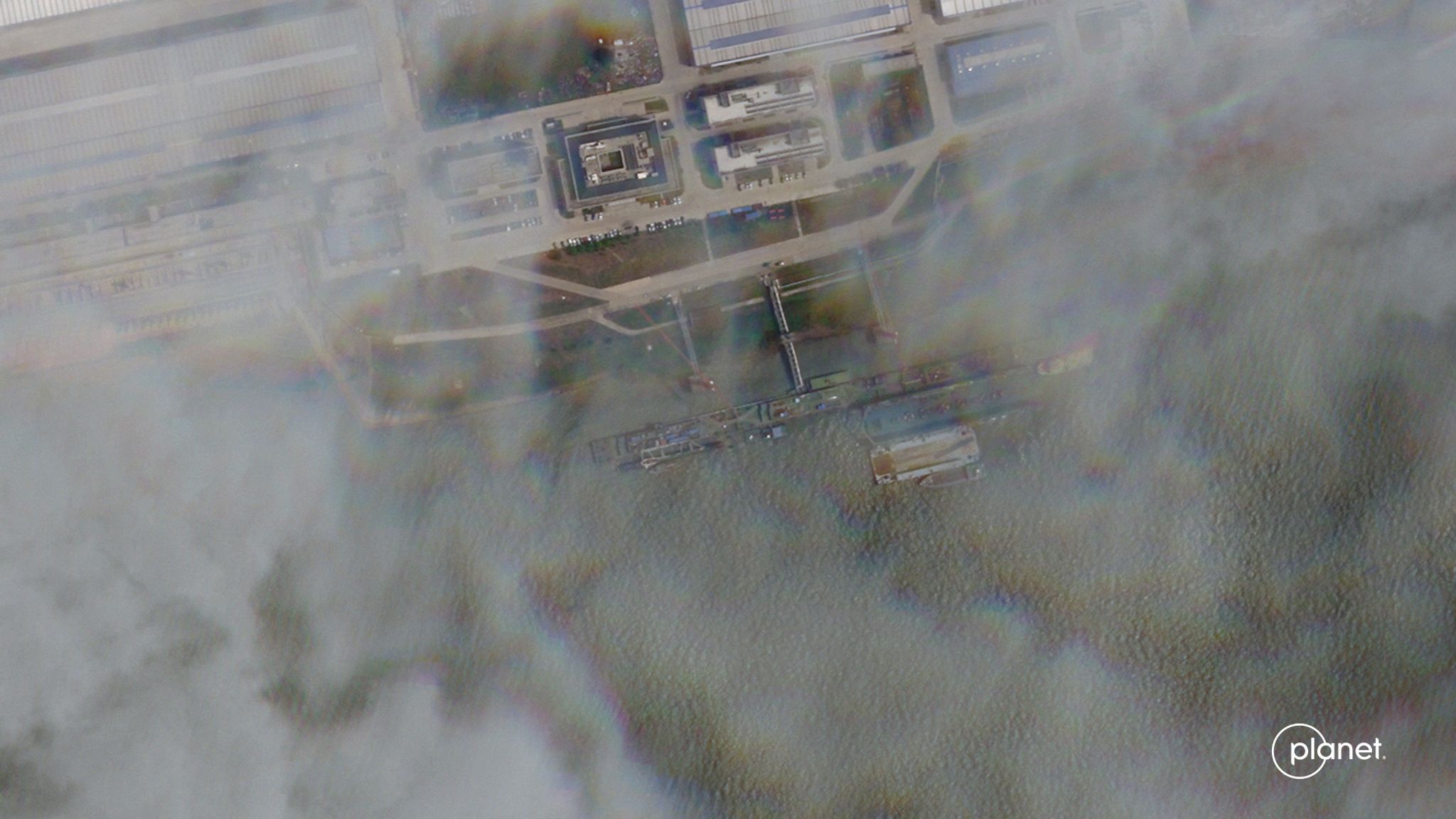 Satellite images show China's new nuclear submarine sinking during ...