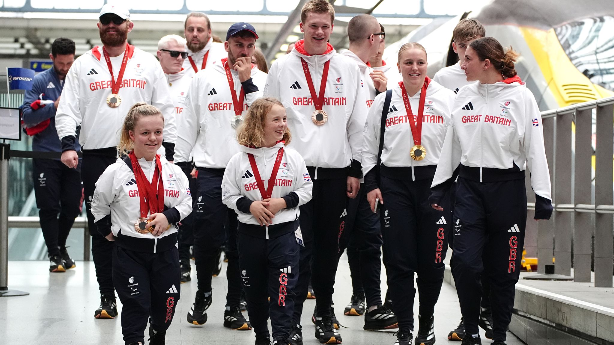 Paralympians arrive back in UK amid calls for more school support for ...