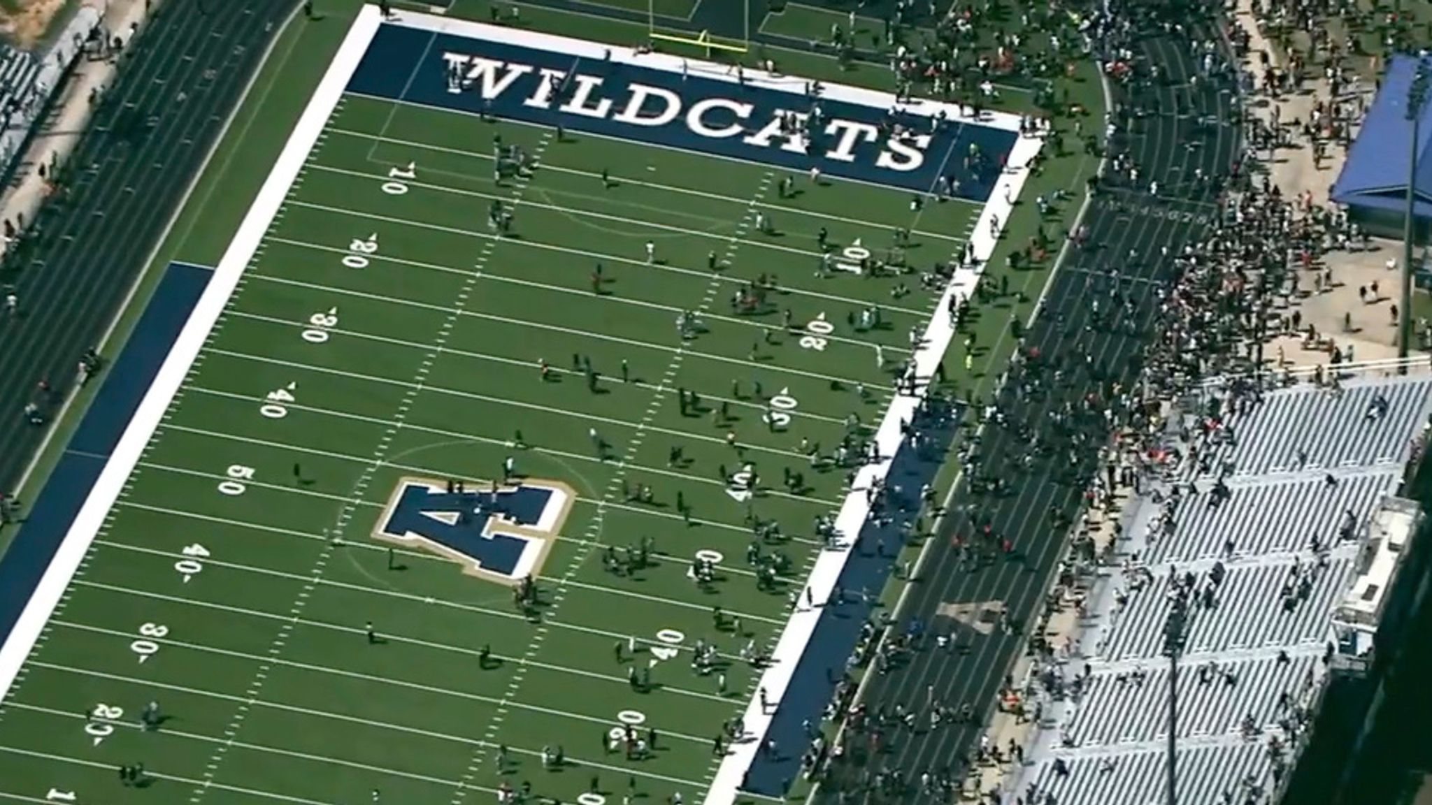 Two students and two teachers killed in Georgia school shooting - as 14 ...