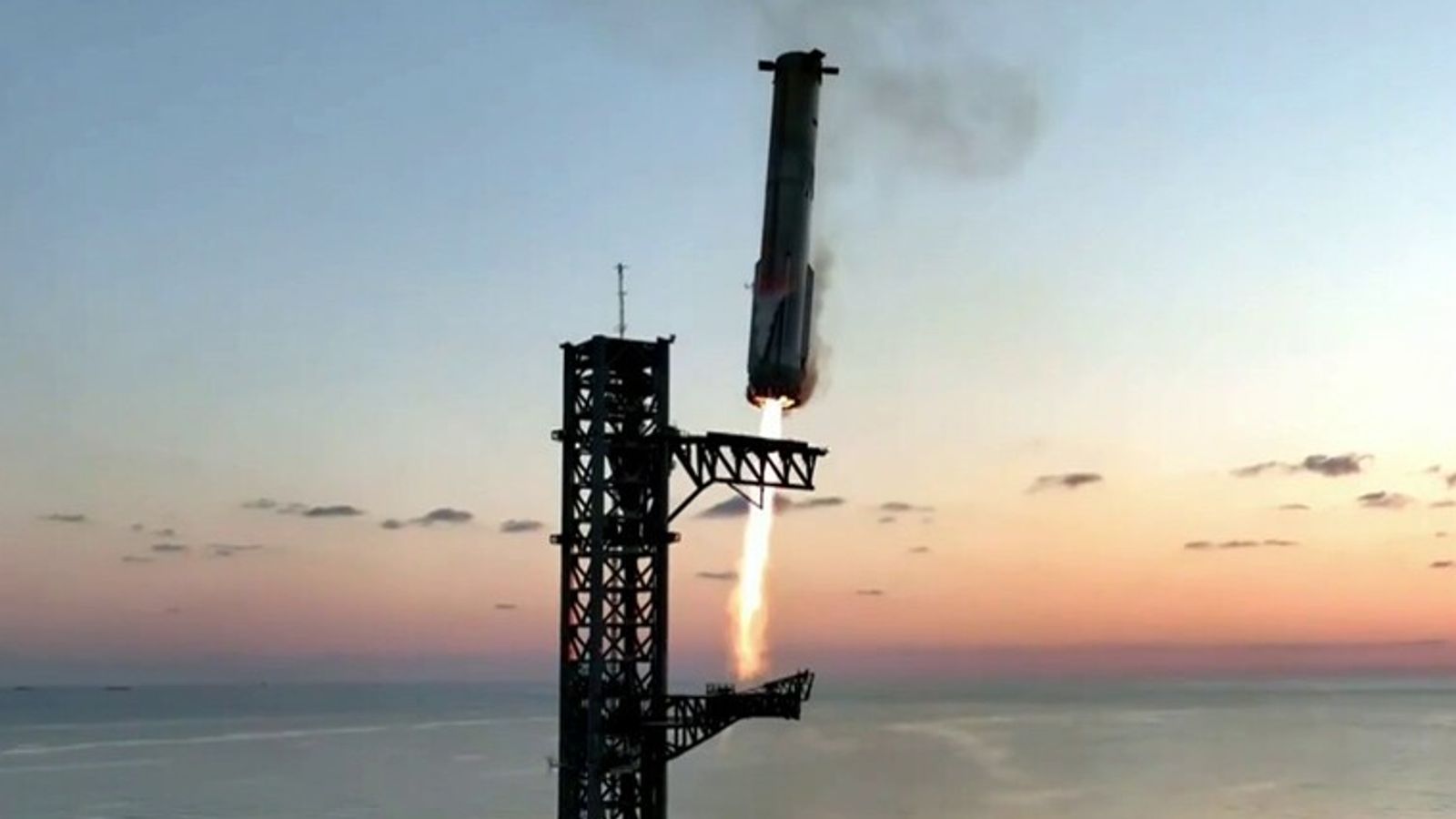 SpaceX: Moment returning rocket booster successfully caught | Science ...