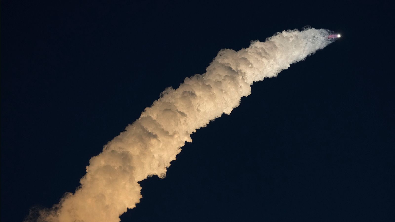 SpaceX rocket booster makes successful landing after test launch - as ...