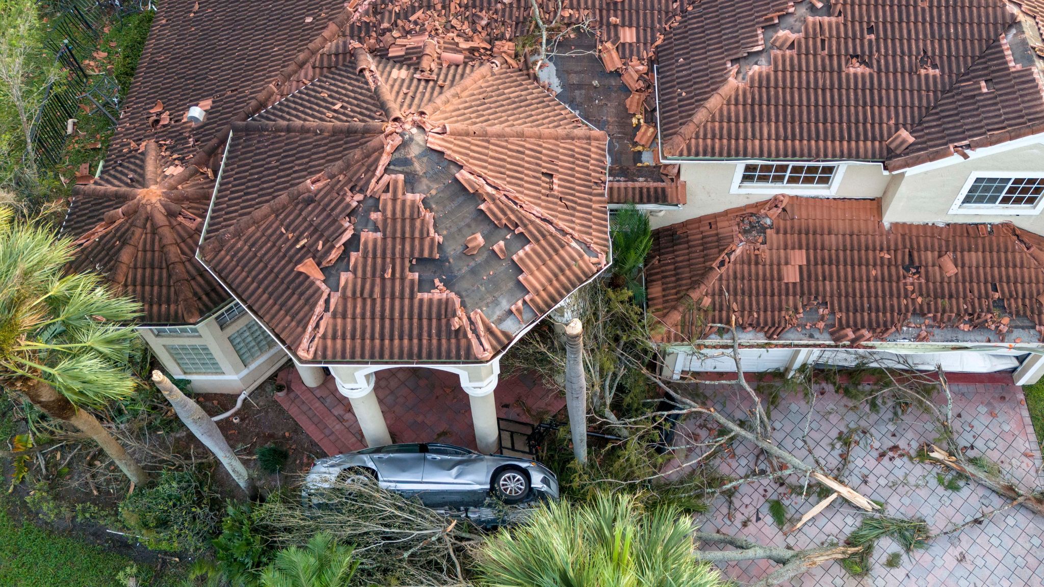 Hurricane Milton crashes into Florida with 120mph winds - destroying homes and leaving millions ...