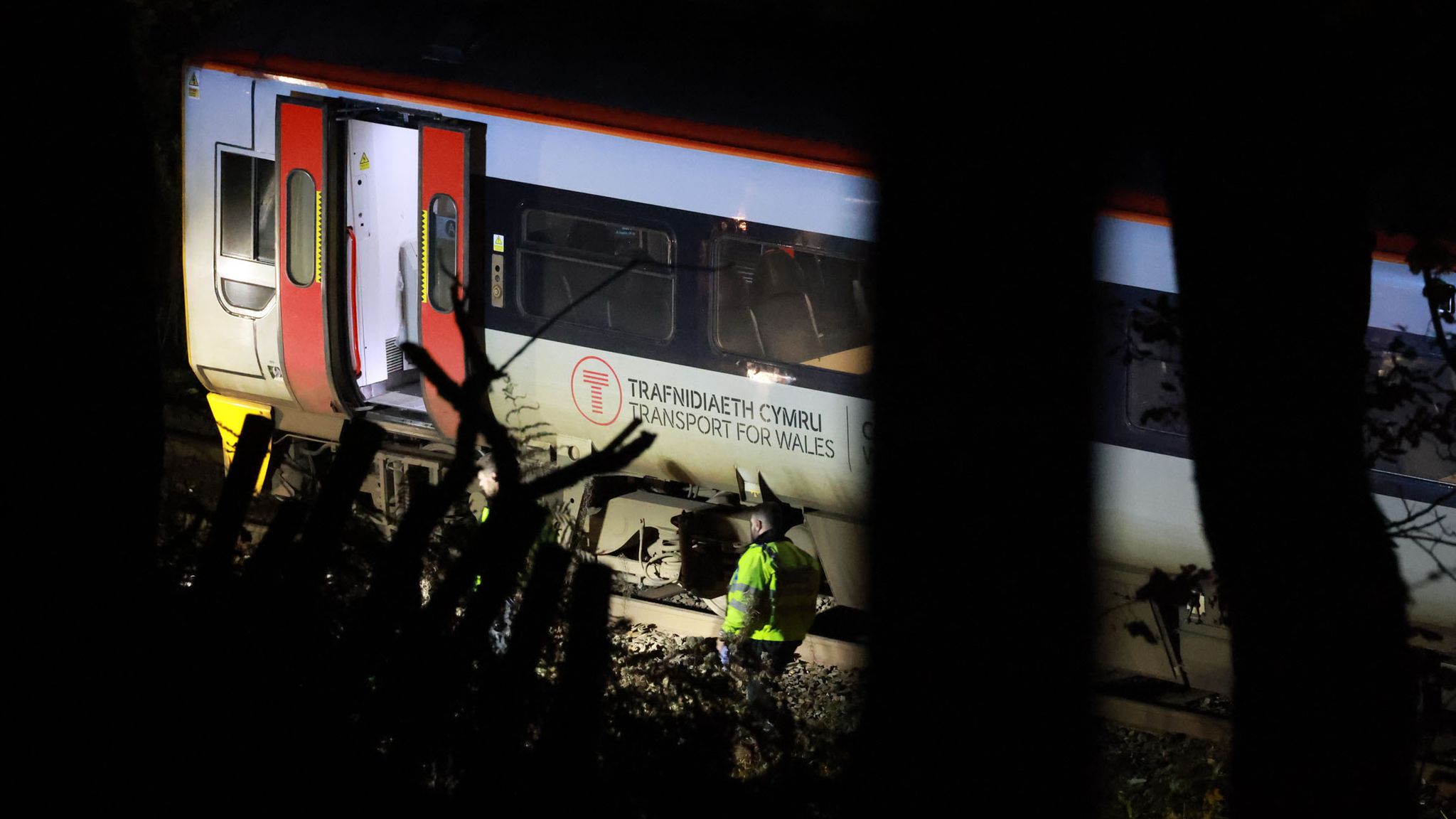 Train 'may have skidded on track' before crash in Wales that left one ...