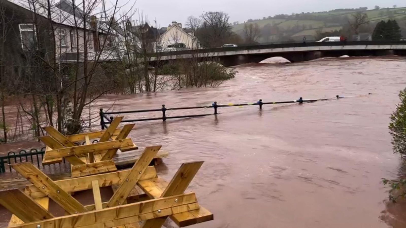 Storm Bert: Heavy rain causes river to burst its banks in Brecon, Wales ...