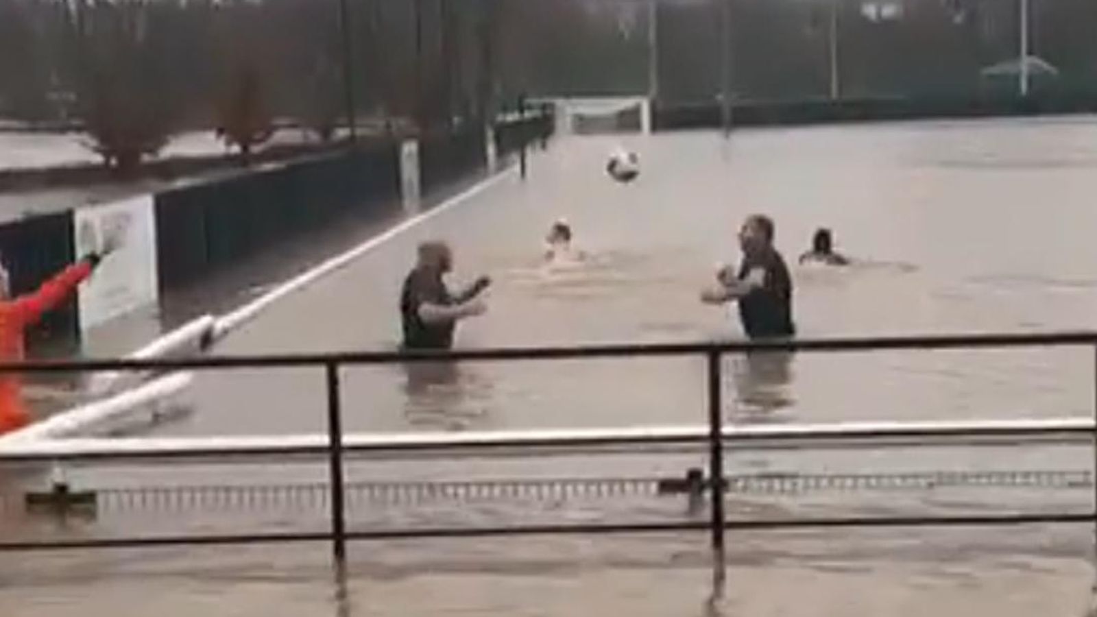 Storm Bert: Footballers turn flooded Gloucestershire pitch into ...
