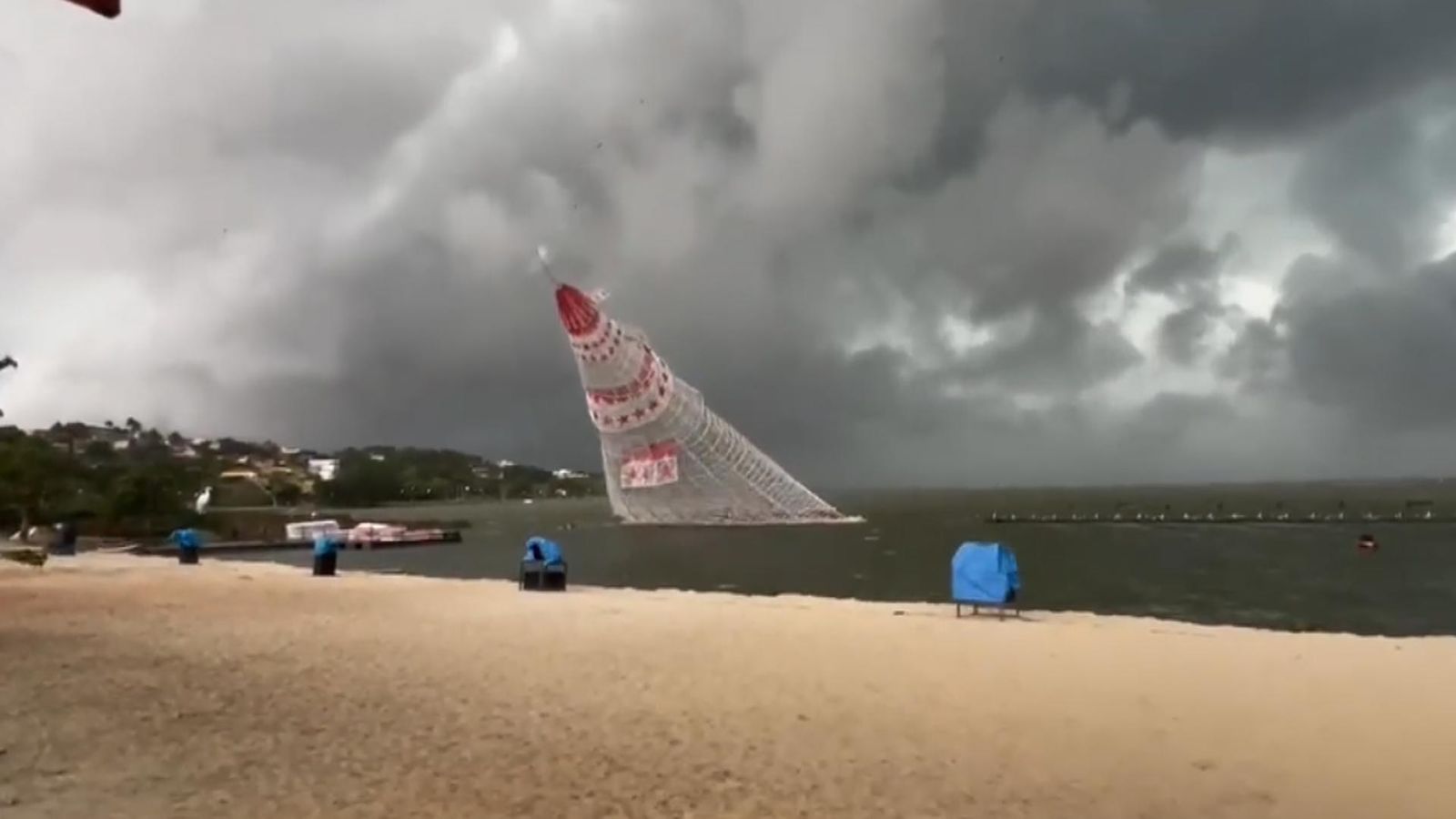 At least one person killed as 56-metre-tall Christmas tree collapses in ...