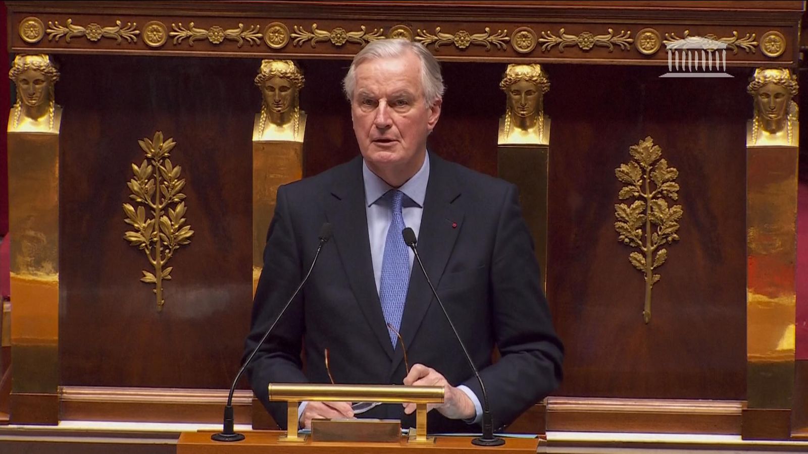 French Prime Minister Michel Barnier addresses lawmakers ahead of no ...