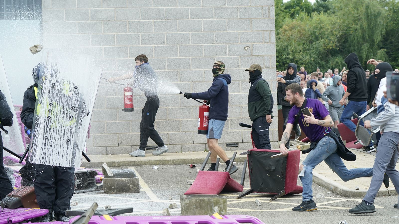 Levi Fishlock: Man who fuelled fire outside migrant hotel given joint ...