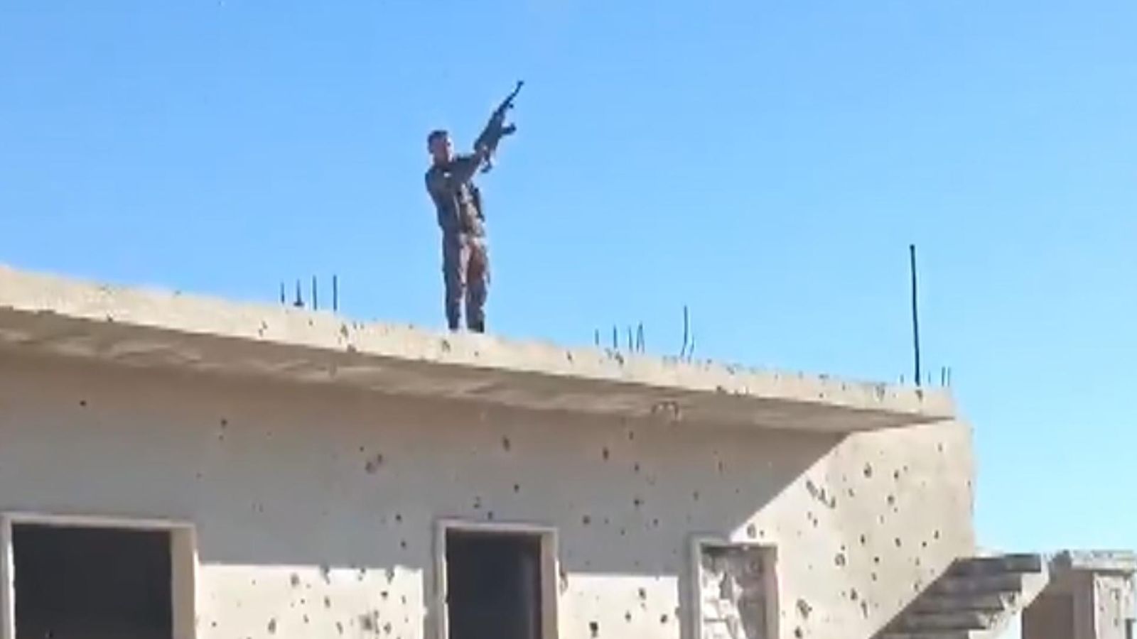 Syria: Hayat Tahrir al Sham rebels celebrate in captured village | World News | Sky News