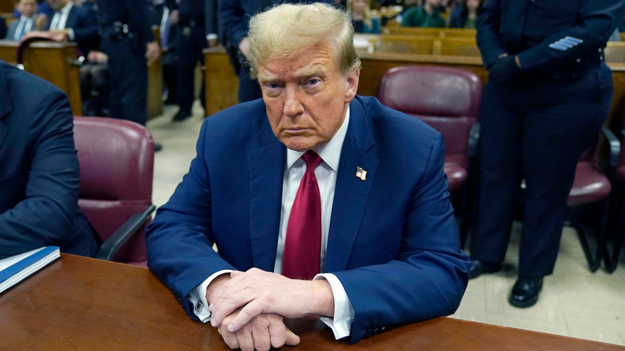 Donald Trump says he's 'totally innocent' and thanks judge moments ...