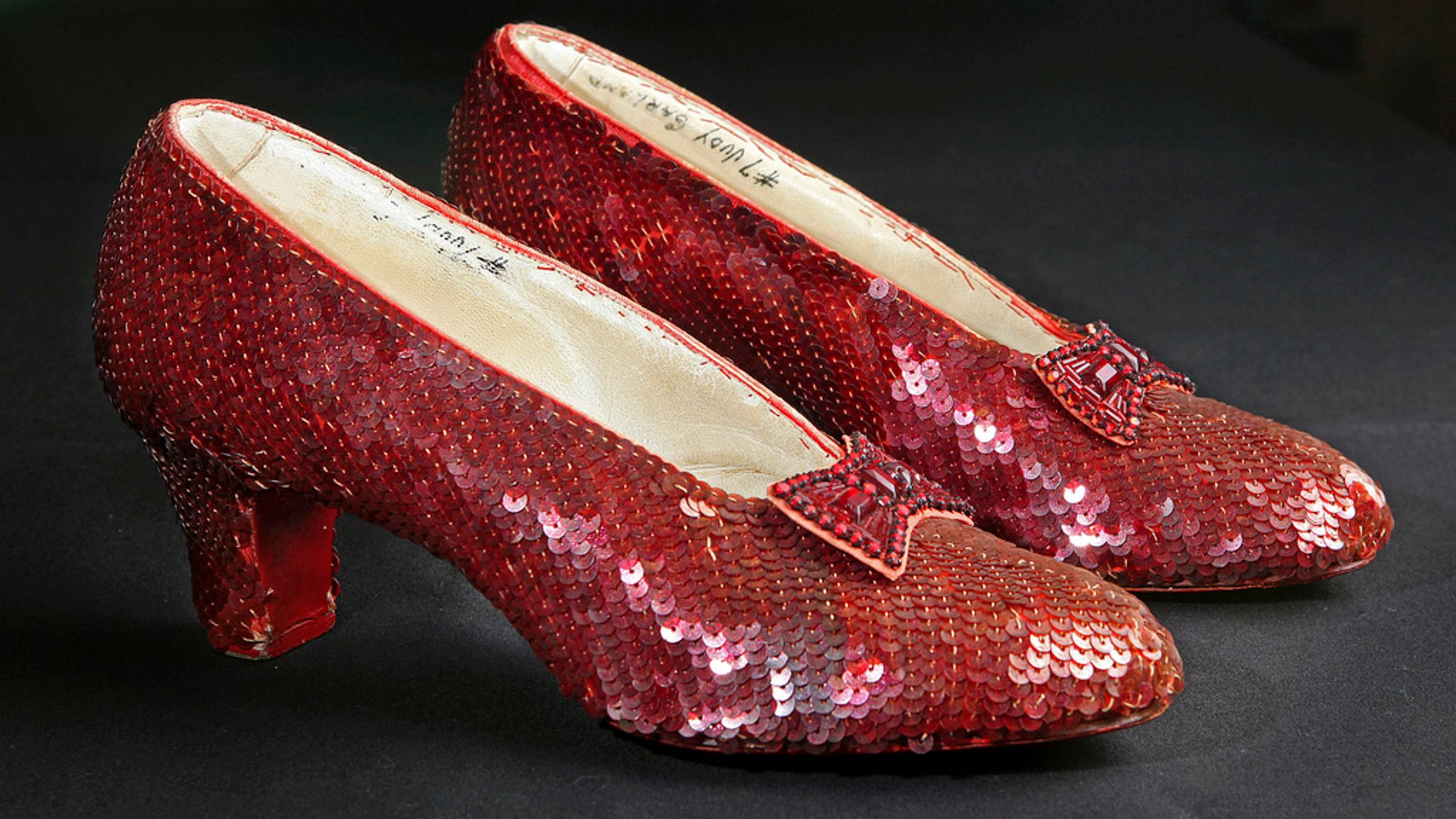 Ruby slippers worn by Judy Garland in The Wizard Of Oz sell for $28m at ...