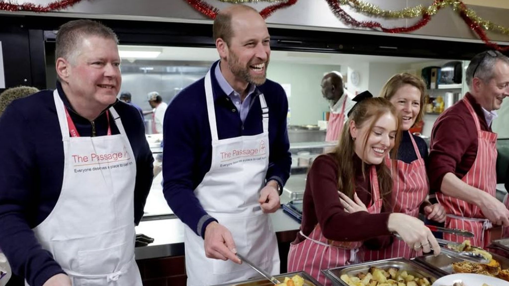 Prince William serves Christmas lunch at The Passage homeless shelter ...