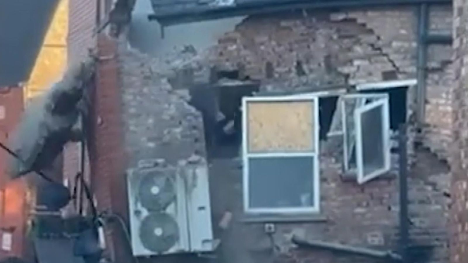 Moment historic red-brick building collapses in Hale after Storm Eowyn ...