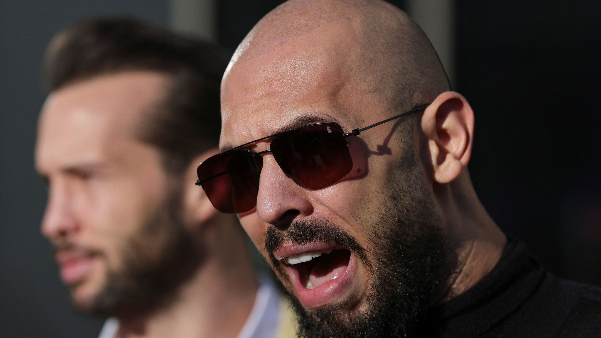 Andrew Tate house arrest order lifted by court in Romania | World News ...