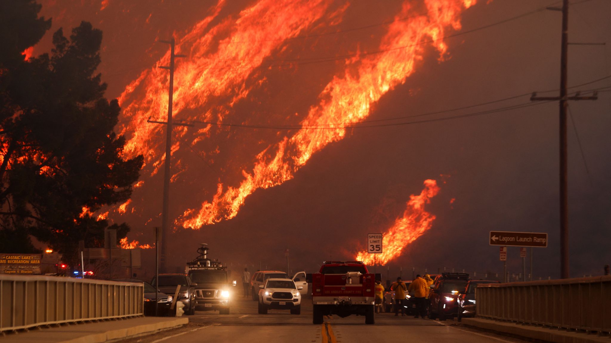 California wildfires: More than 30,000 flee as fire erupts north of Los ...